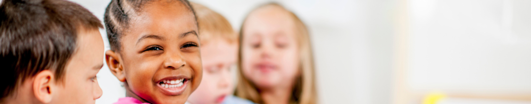 children smiling copy - Assisting Hands Yorba Linda